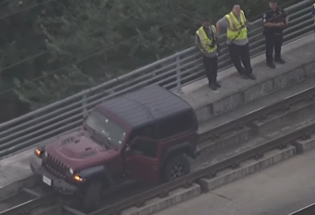 Jeep Stalls On Houston Rail Tracks, Sparks Curiosity - Loyal Conservatives